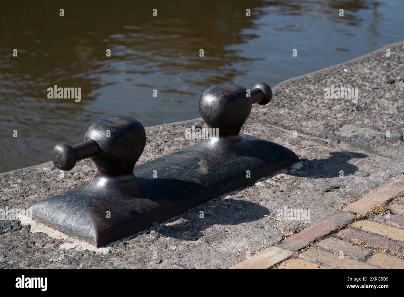 Iron bollard clamp to secure a boat to the quay, indispensable when ...