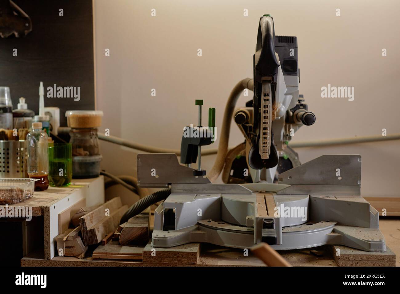 Well-organized woodworking station featuring an electric sawmill device ...