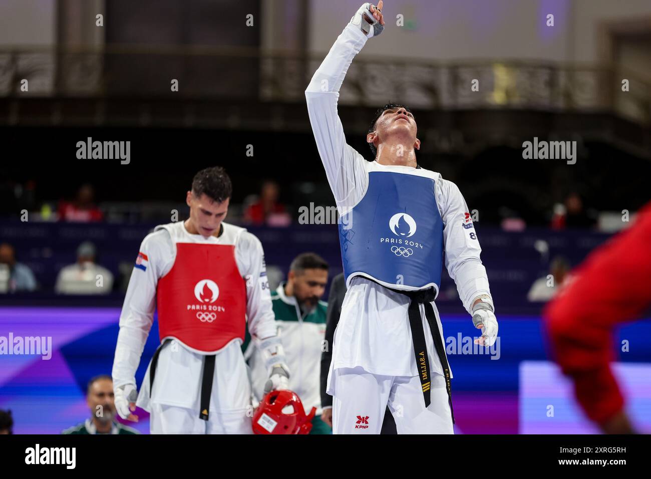 Paris, France. 10th Aug, 2024. Arian Salimi of Iran (blue) celebrates ...