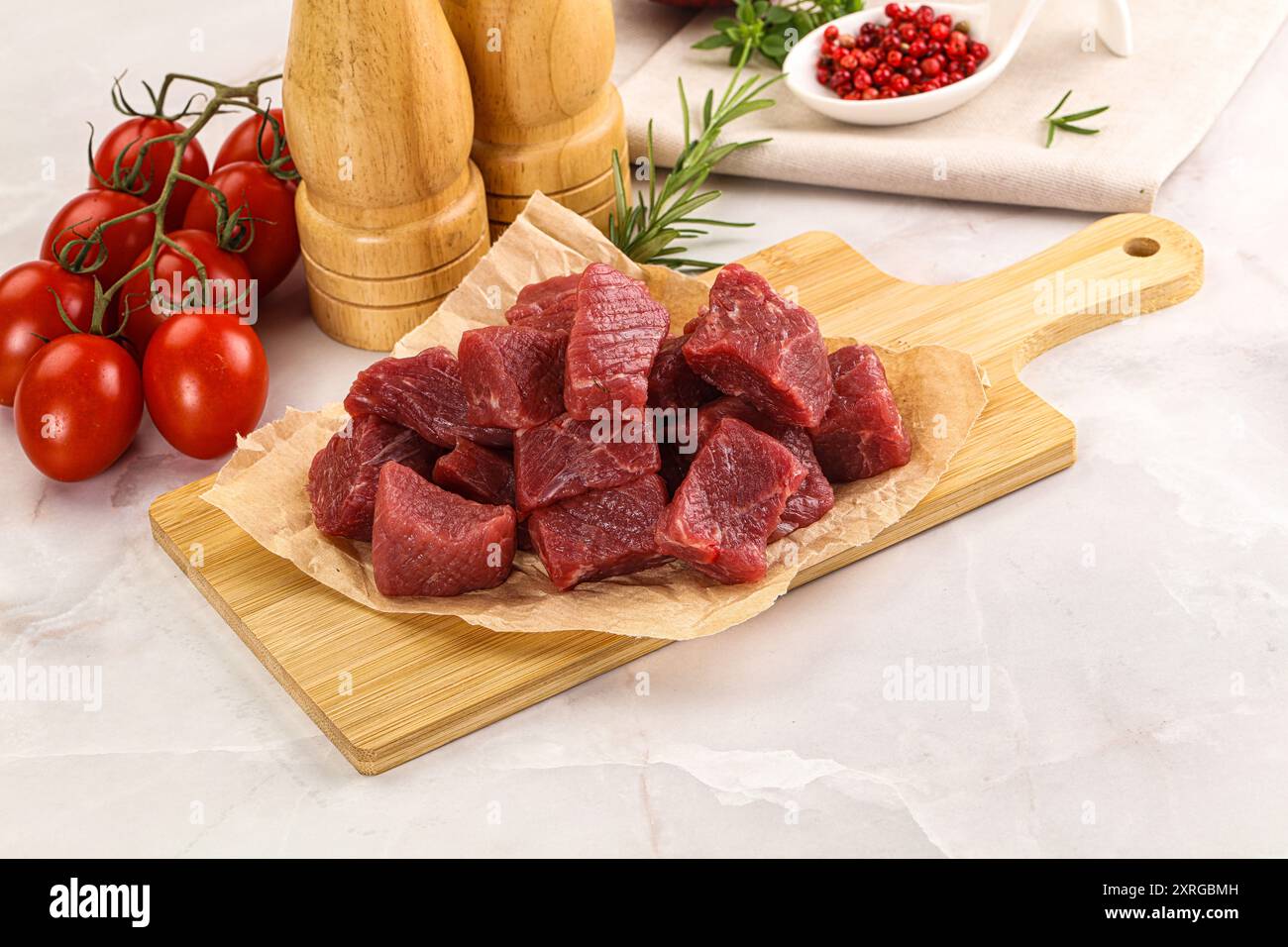 Raw beef diced cubes for cooking Stock Photo - Alamy