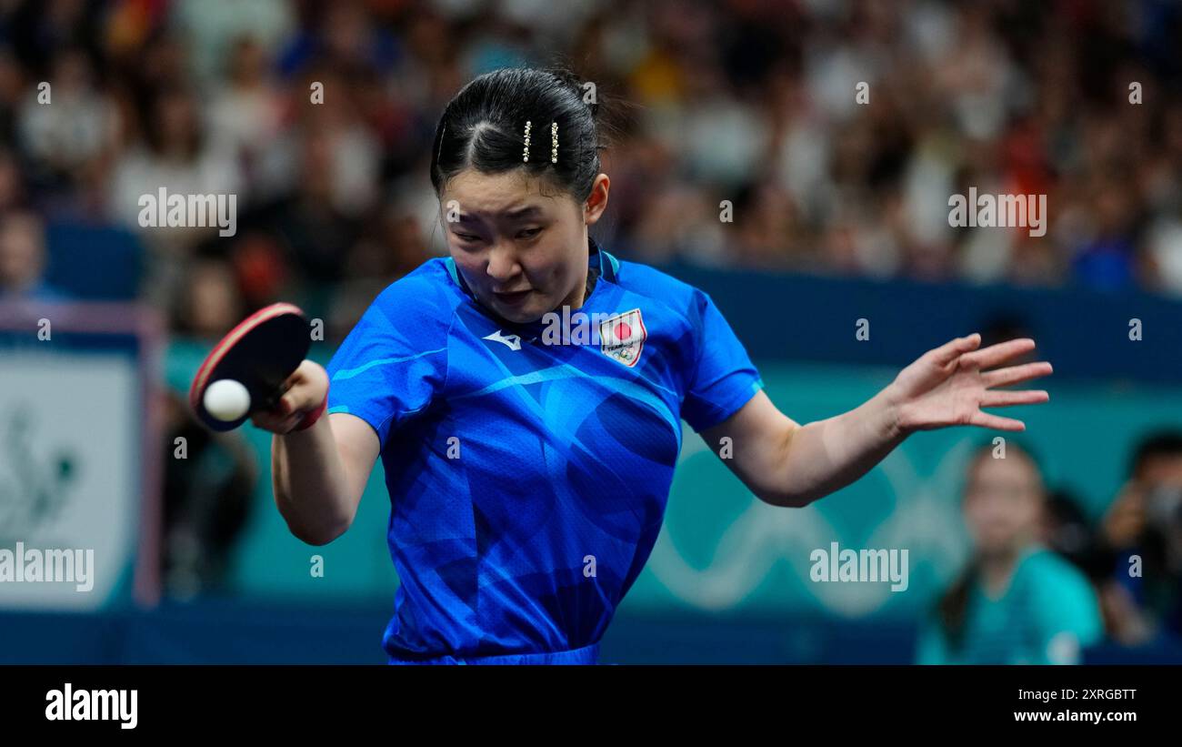 Japan's Miwa Harimoto plays against China's Wang Manyu during the women ...