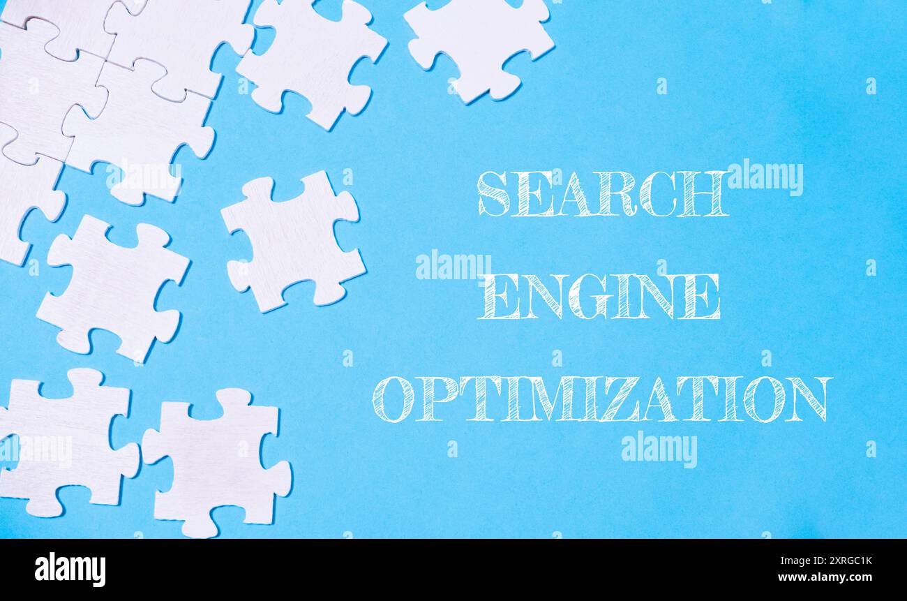 A puzzle with the words search engine optimization written on it. The ...