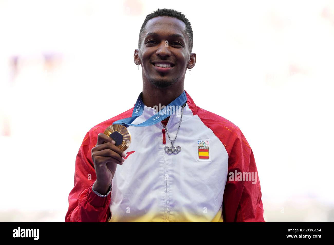 Men's triple jump gold medalist, Jordan Alejandro Diaz Fortun, of Spain, stands with his medal ...
