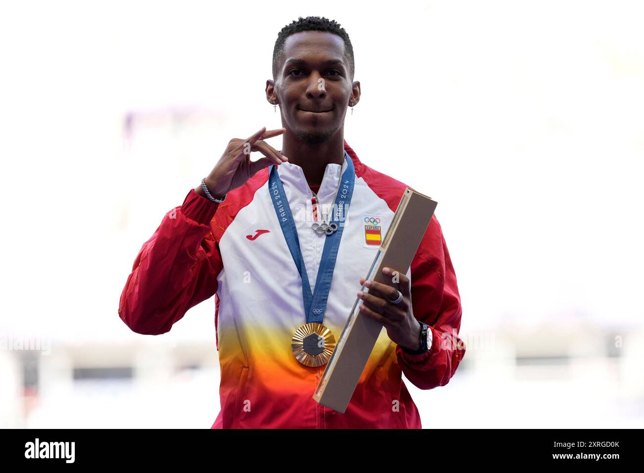 Men's triple jump gold medalist, Jordan Alejandro Diaz Fortun, of Spain, stands with his medal ...