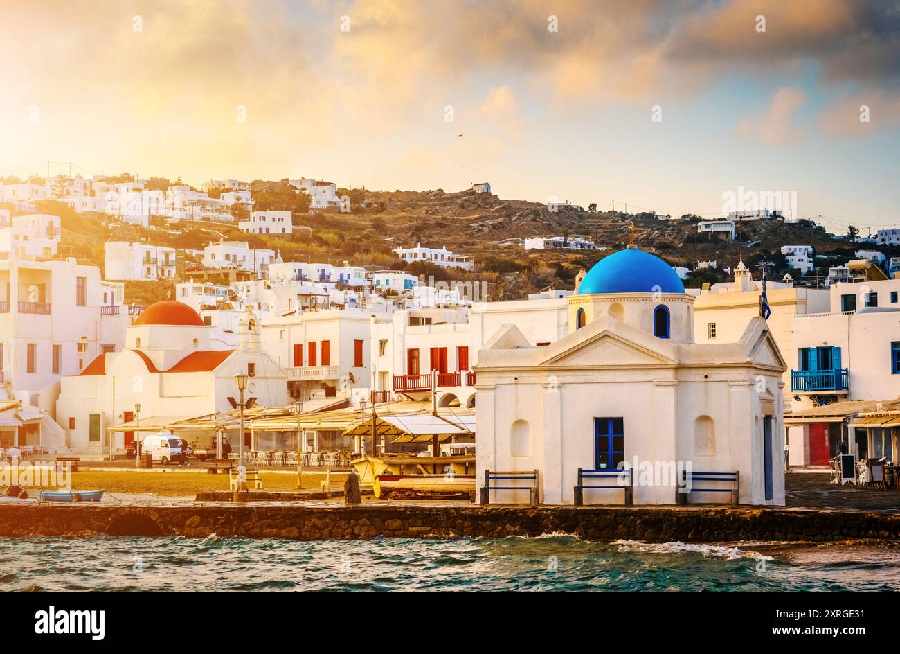 Colourful seafront with greek churches of Mykonos at sunset, view from ...