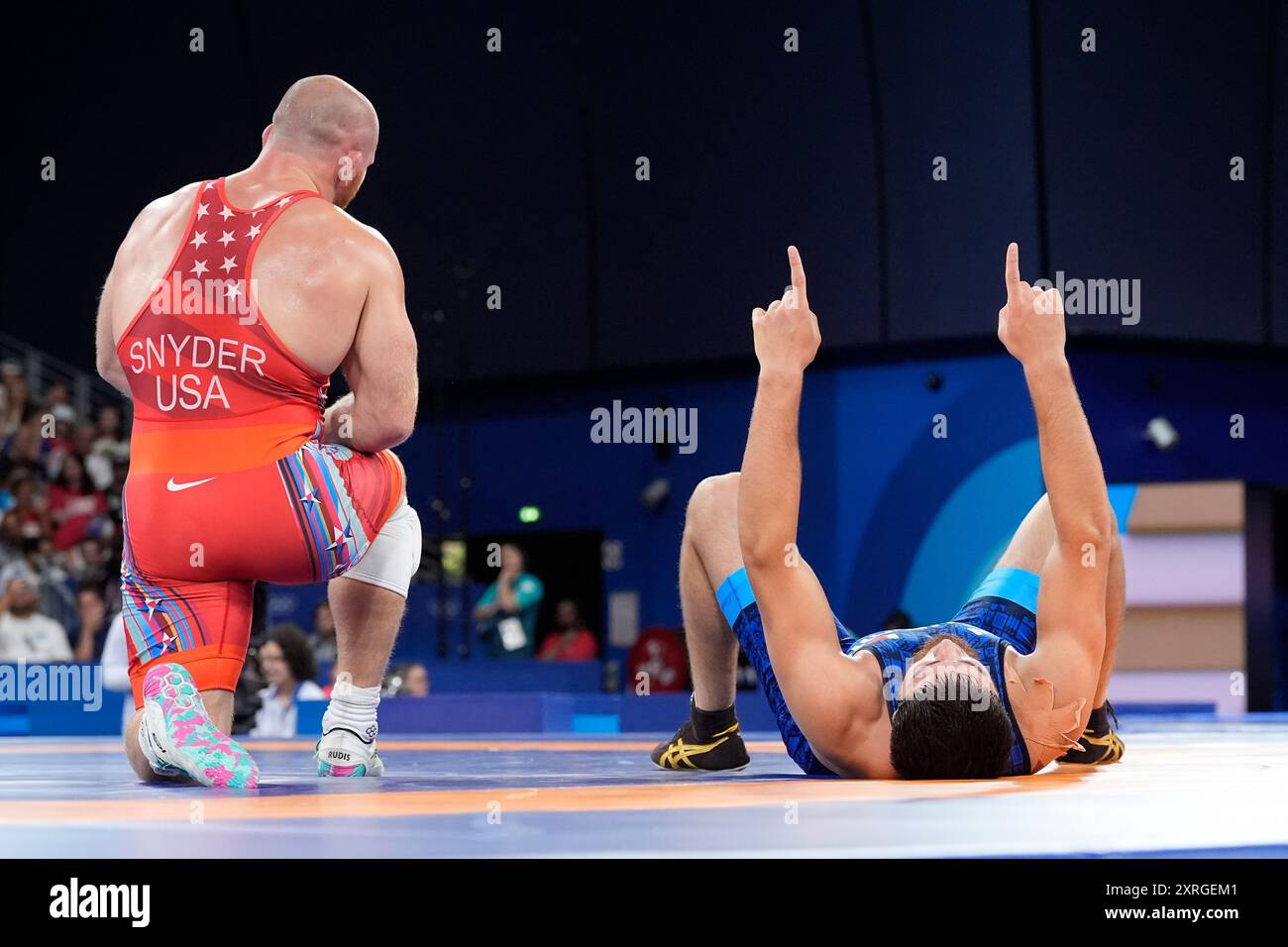 Bahrain's Akhmed Tazhudinov celebrates after defeating Kyle Frederick ...