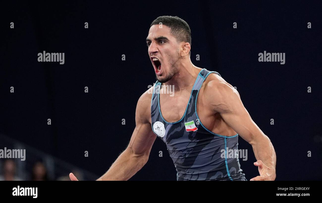 Iran's Rahman Amouzadkhalili celebrates after defeating Hungary's ...