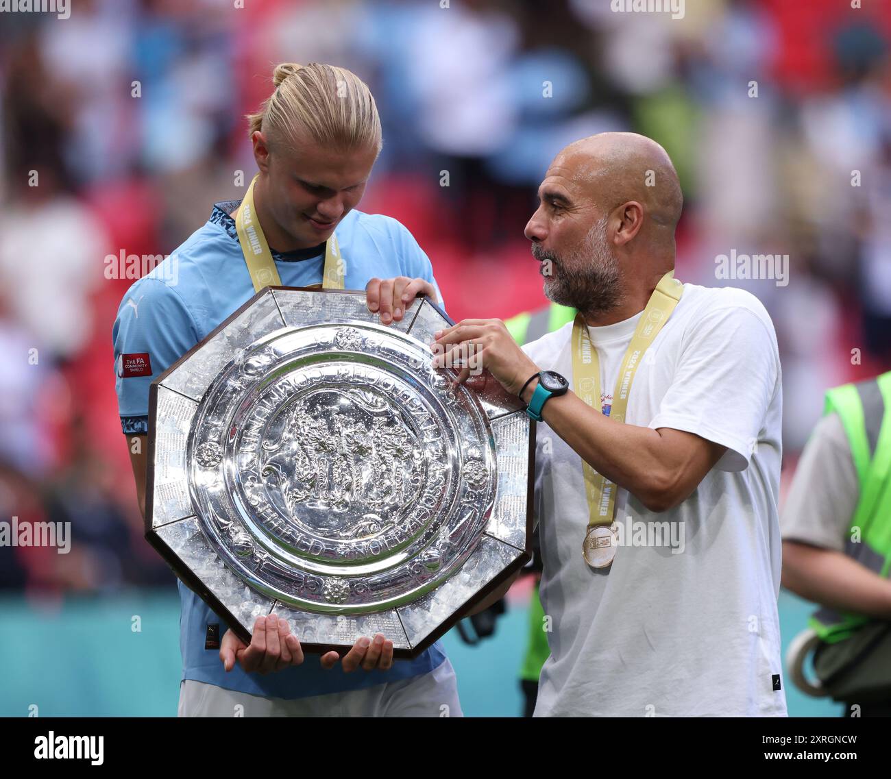 London, UK. 10th Aug, 2024. Erling Haaland (MC) and Pep Guardiola (Man ...