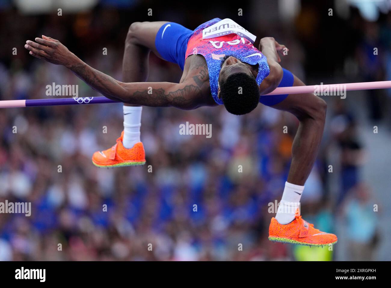 Shelby McEwen, of the United States, competes in the men's high jump ...