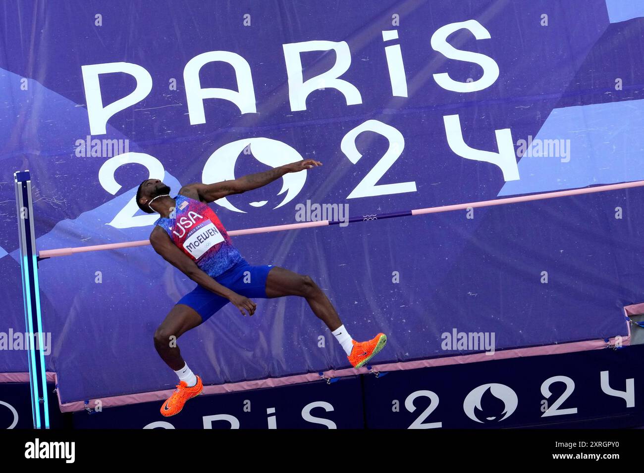 Shelby McEwen, of the United States, competes in the men's high jump ...