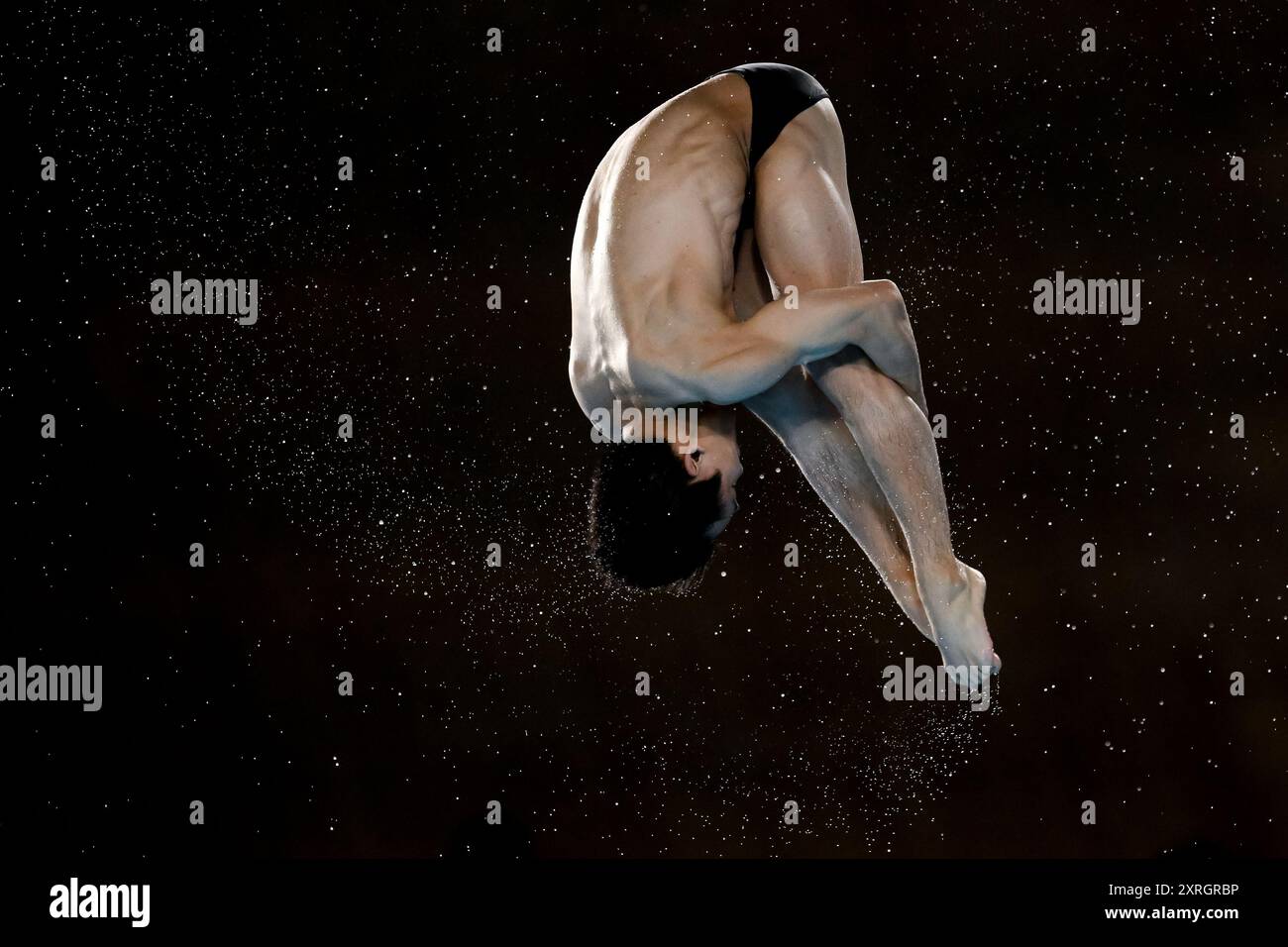 Paris, France. 10th Aug, 2024. Yuan Cao of China competes in the diving ...