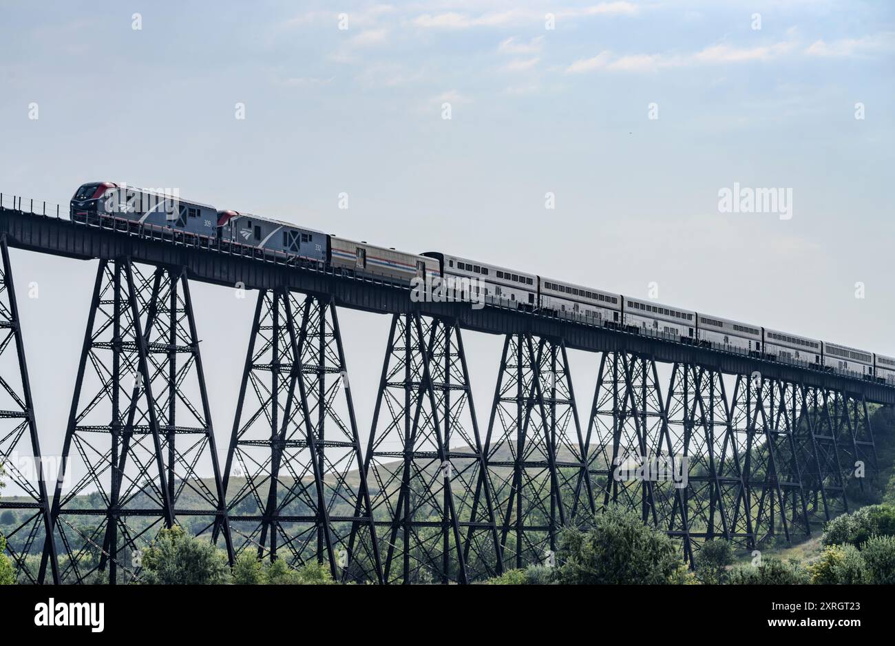 Amtrak's westbound Empire Builder passenger train crosses the Gassman Coulee trestle west of ...