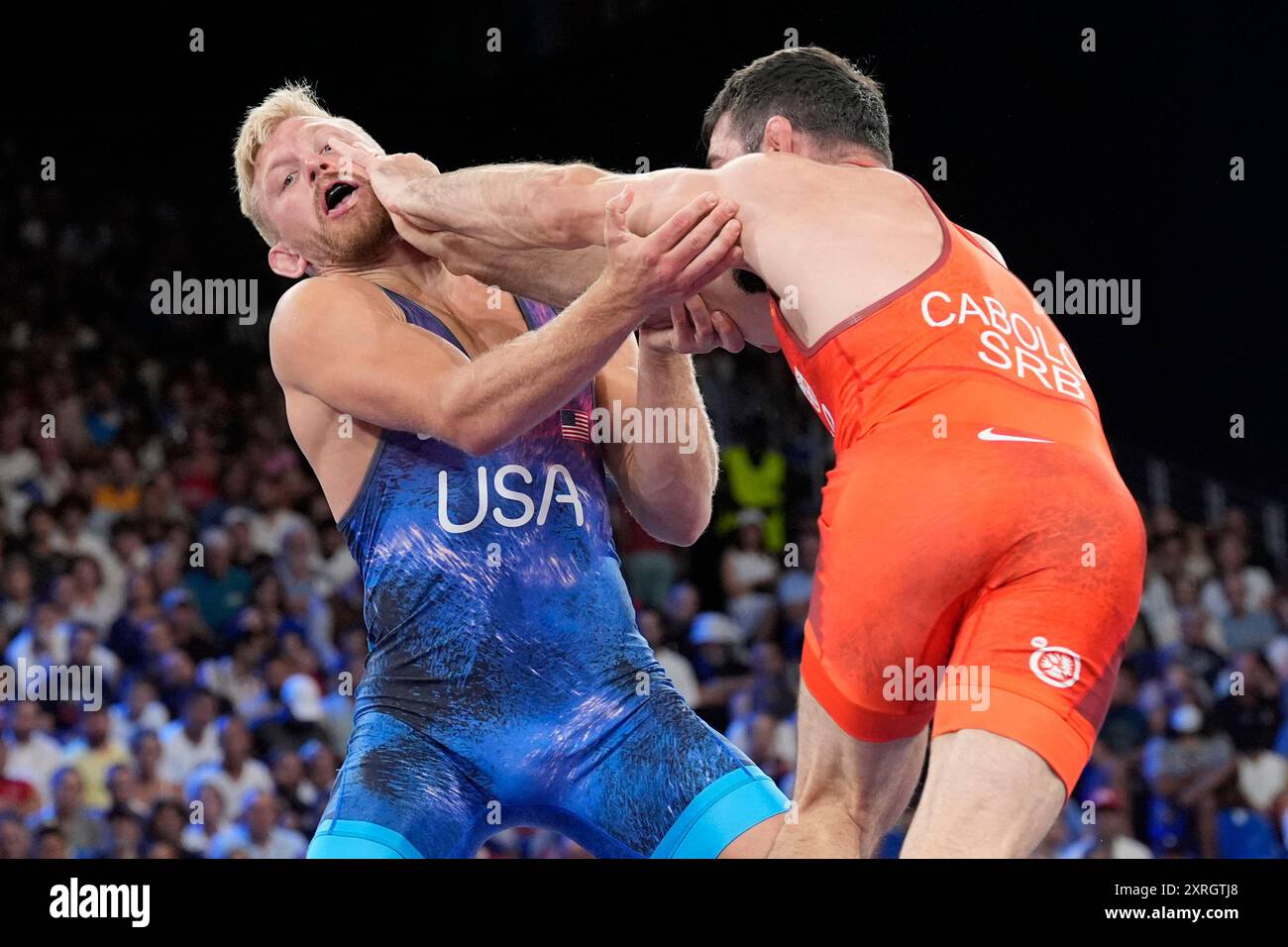Serbia's Hetik Cabolov and Kyle Douglas Dake, of the United States, in ...
