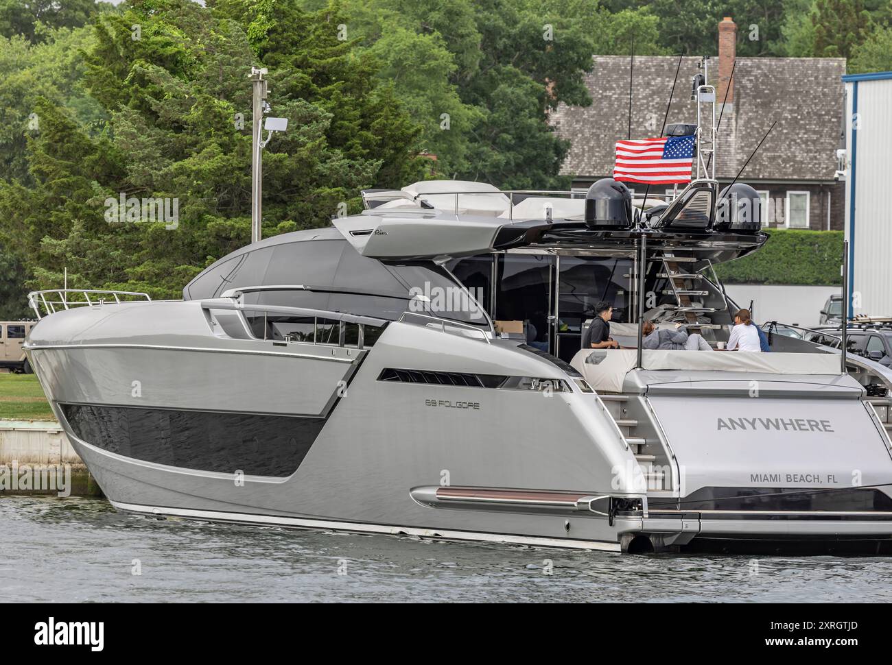 Motor yacht Anywhere at dock in three mile harbor Stock Photo - Alamy
