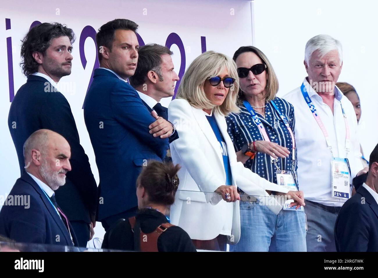 French President Emmanuel Macron, third left, and his wife Brigitte, to ...