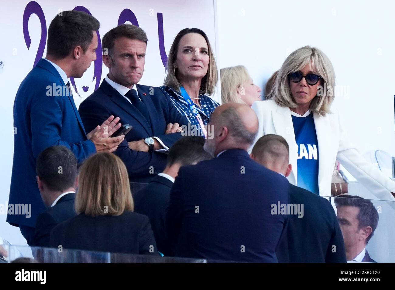 French President Emmanuel Macron, second left, and his wife Brigitte ...