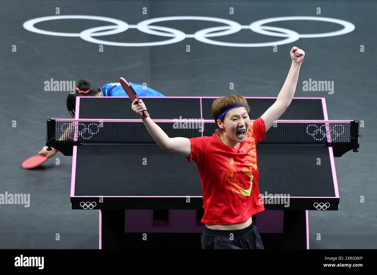 Paris, France. 10th Aug, 2024. Wang Manyu of China celebrates after the ...