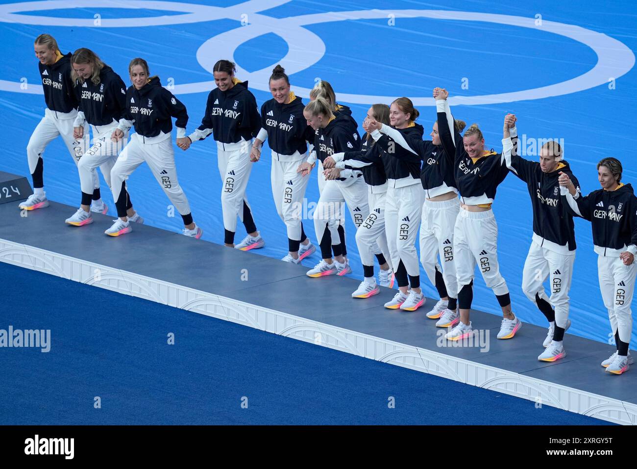 Germany's players go on the podium to receive their bronze medal for ...