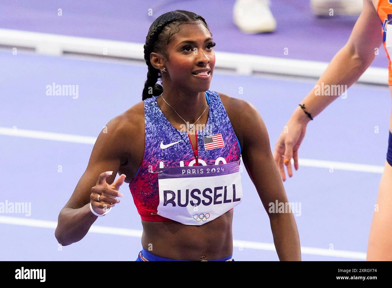 Masai Russell, of the United States, celebrates after winning the women ...