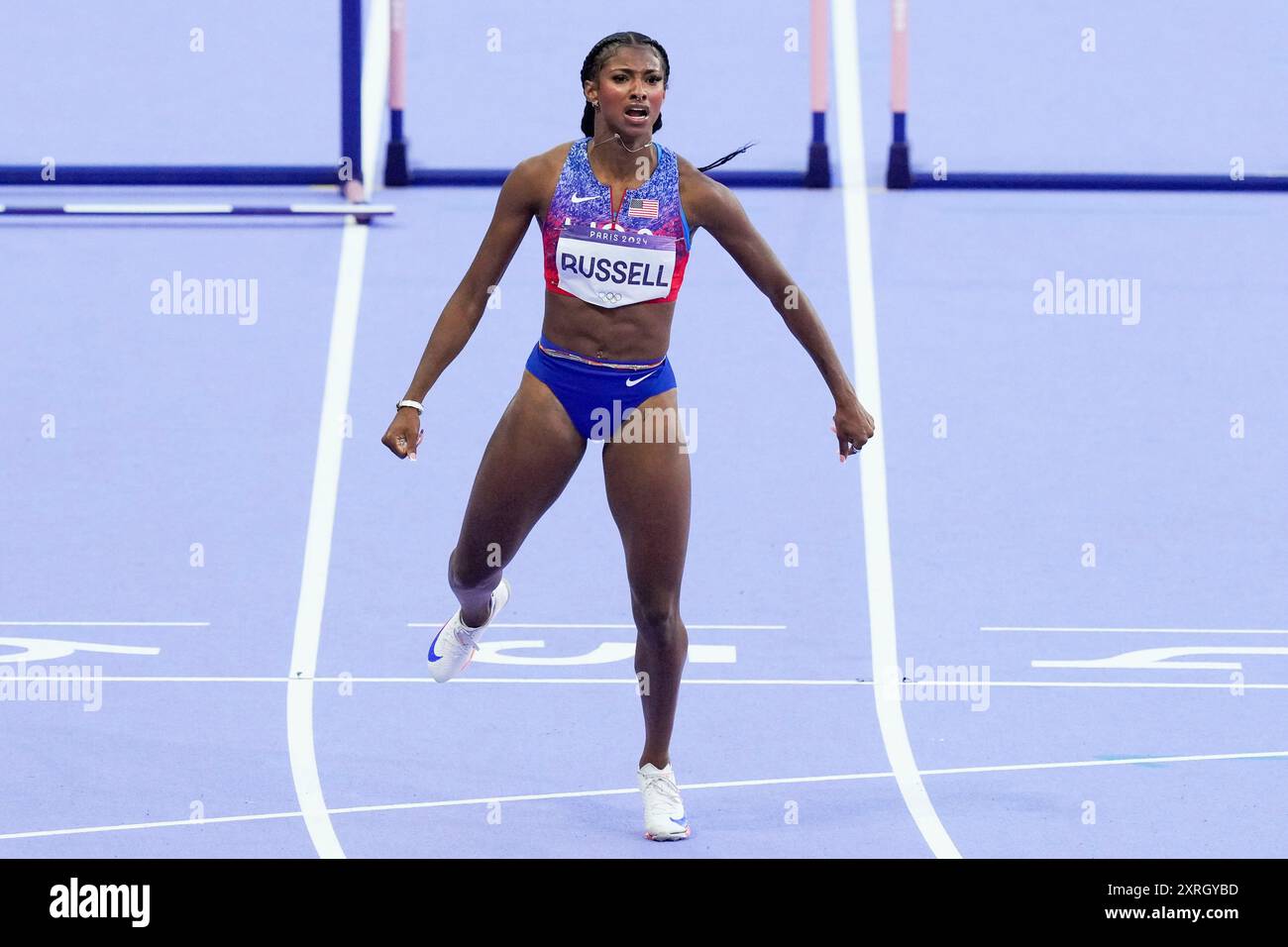 Masai Russell, of the United States, celebrates after winning the women ...