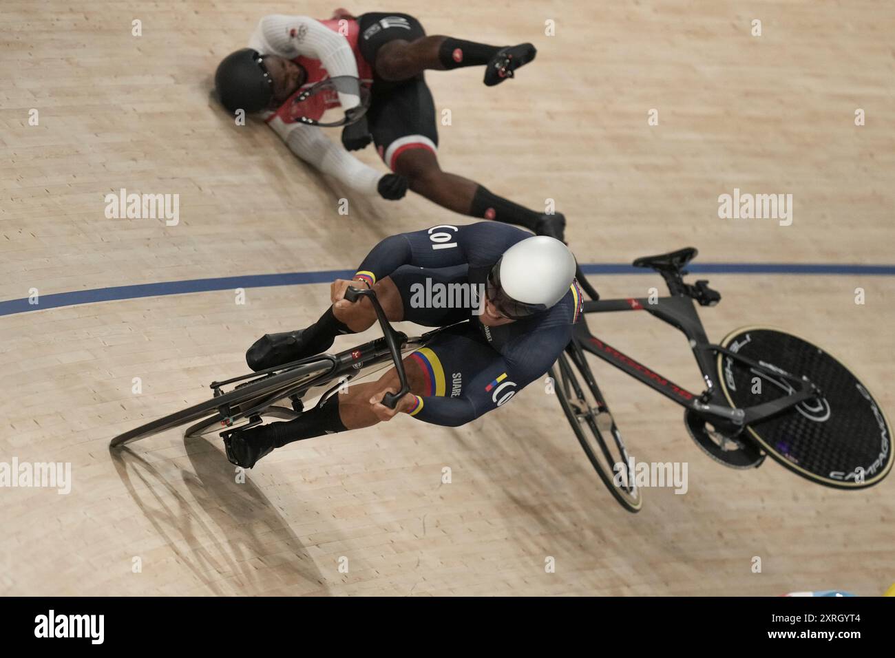 Kwesi Browne of Trinidad And Tobago, top, crashes during the men's ...