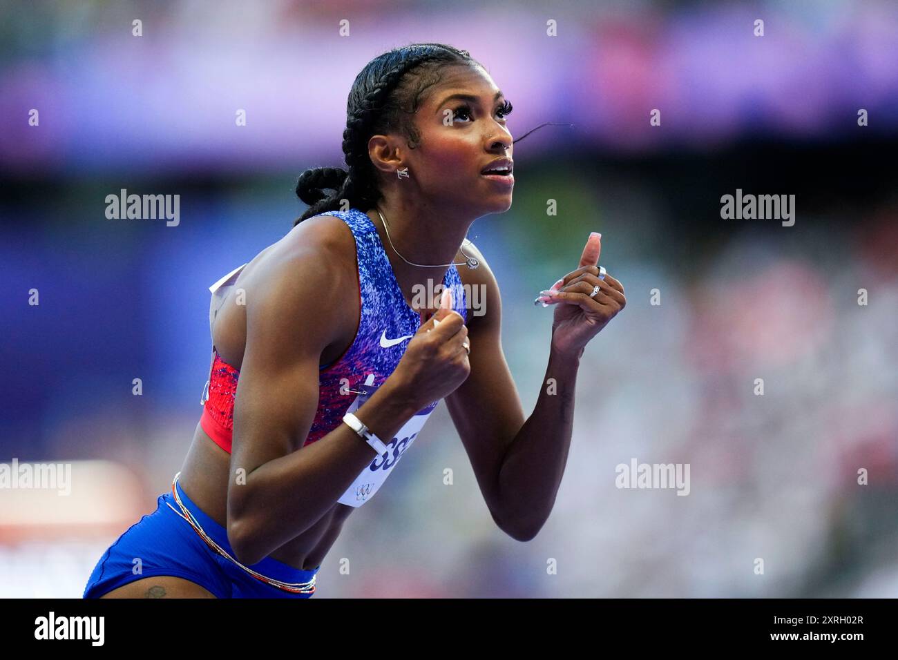 Masai Russell, of the United States, reacts after winning the women's ...