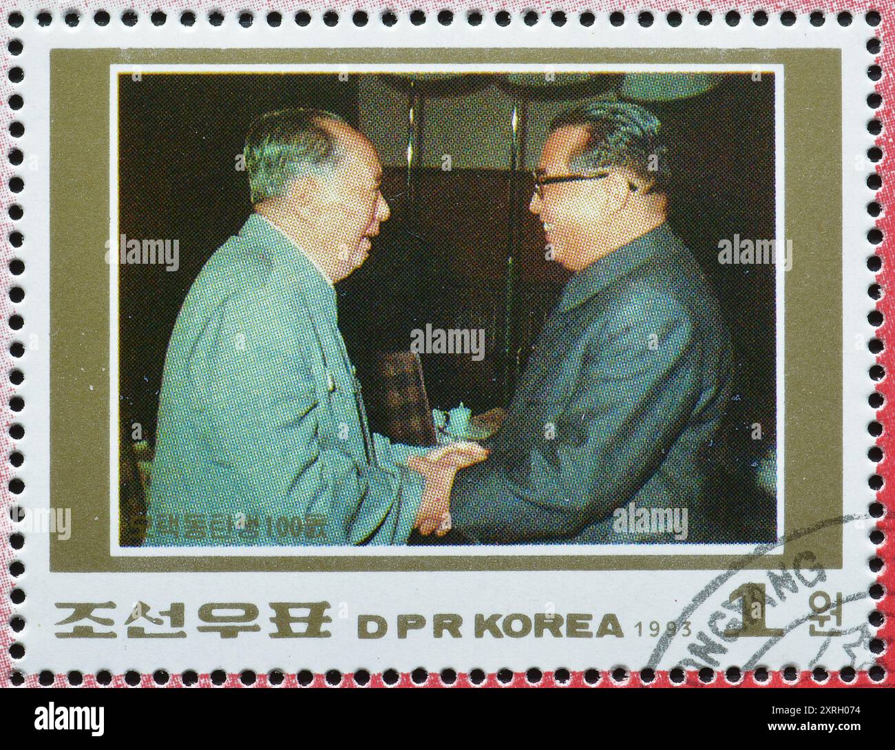 Cancelled postage stamp printed by North Korea, that shows Mao and Kim ...
