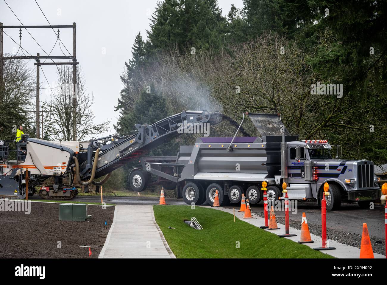 KIRKLAND, WA – JAN 31, 2024: road construction crew working on a ...