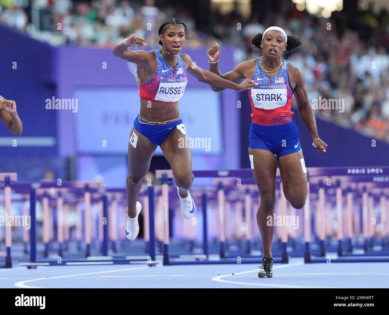 Paris, France. 10th Aug, 2024. Masai Russell of the U.S. (C) crosses ...