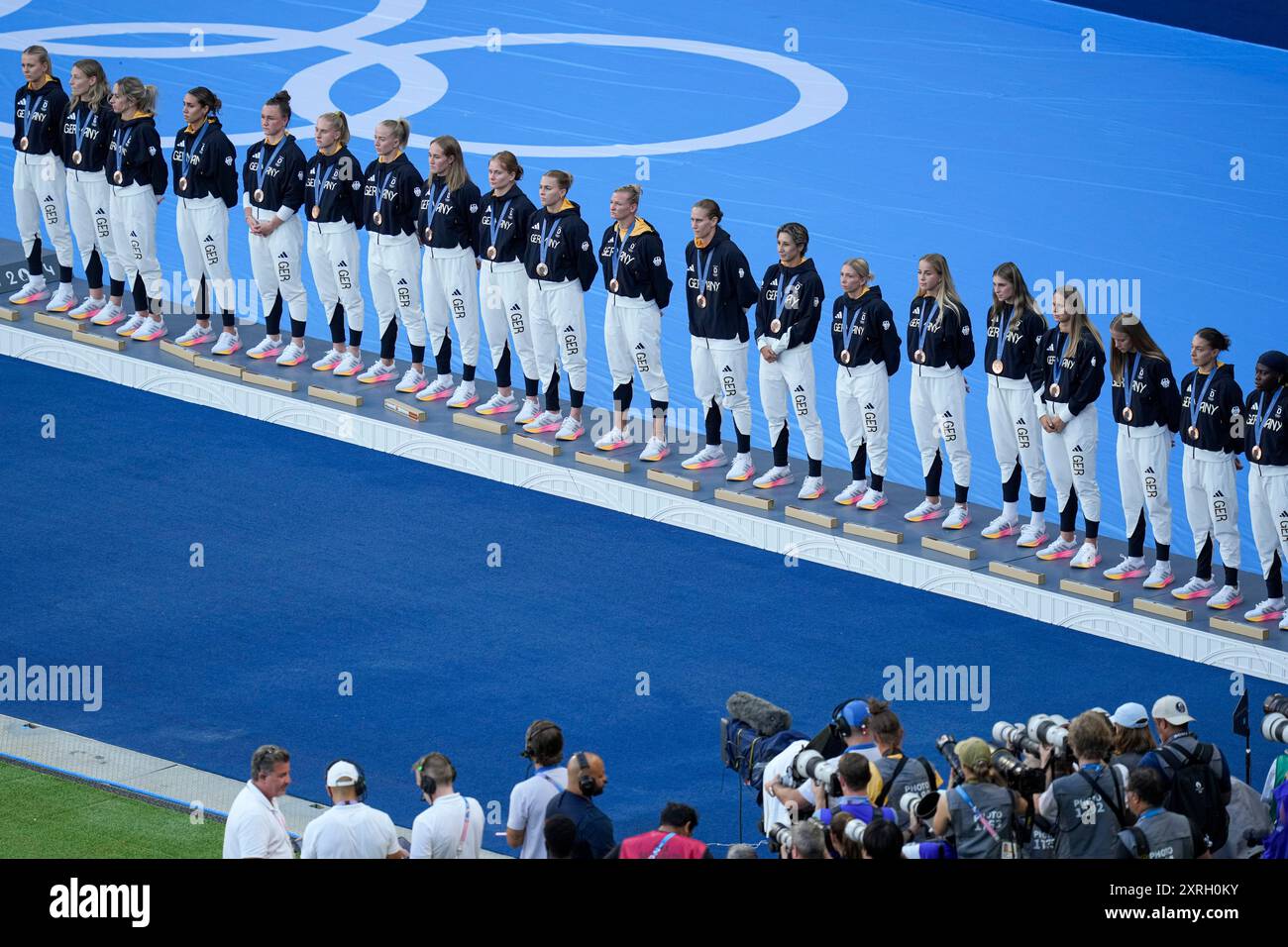 Germany's players pose on the podium with their bronze medals for the ...