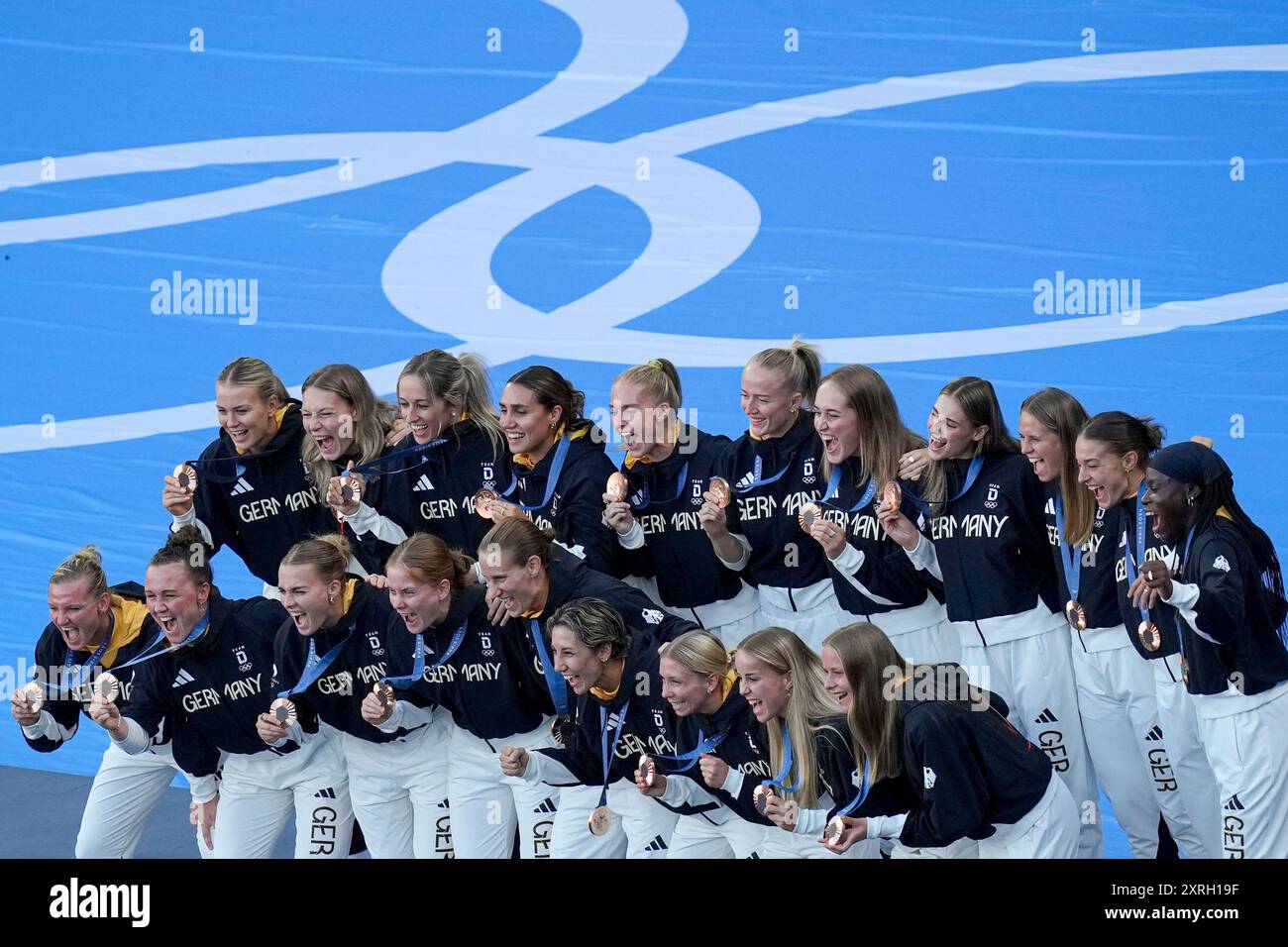 Germany's players pose on the podium with their bronze medals for the ...