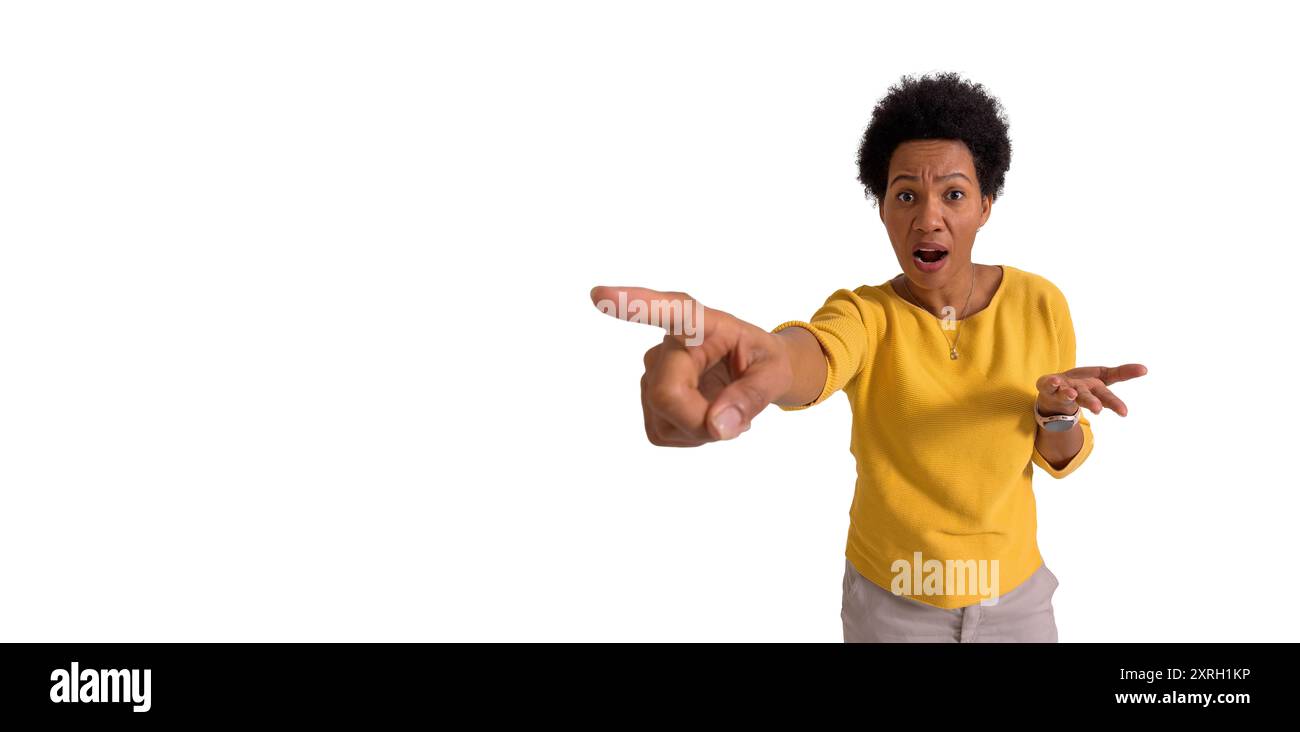 Woman showing displeased expression standing hi-res stock photography ...