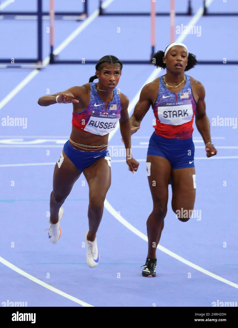 Paris, France. 10th Aug, 2024. Masai Russell of the U.S. (L) crosses ...