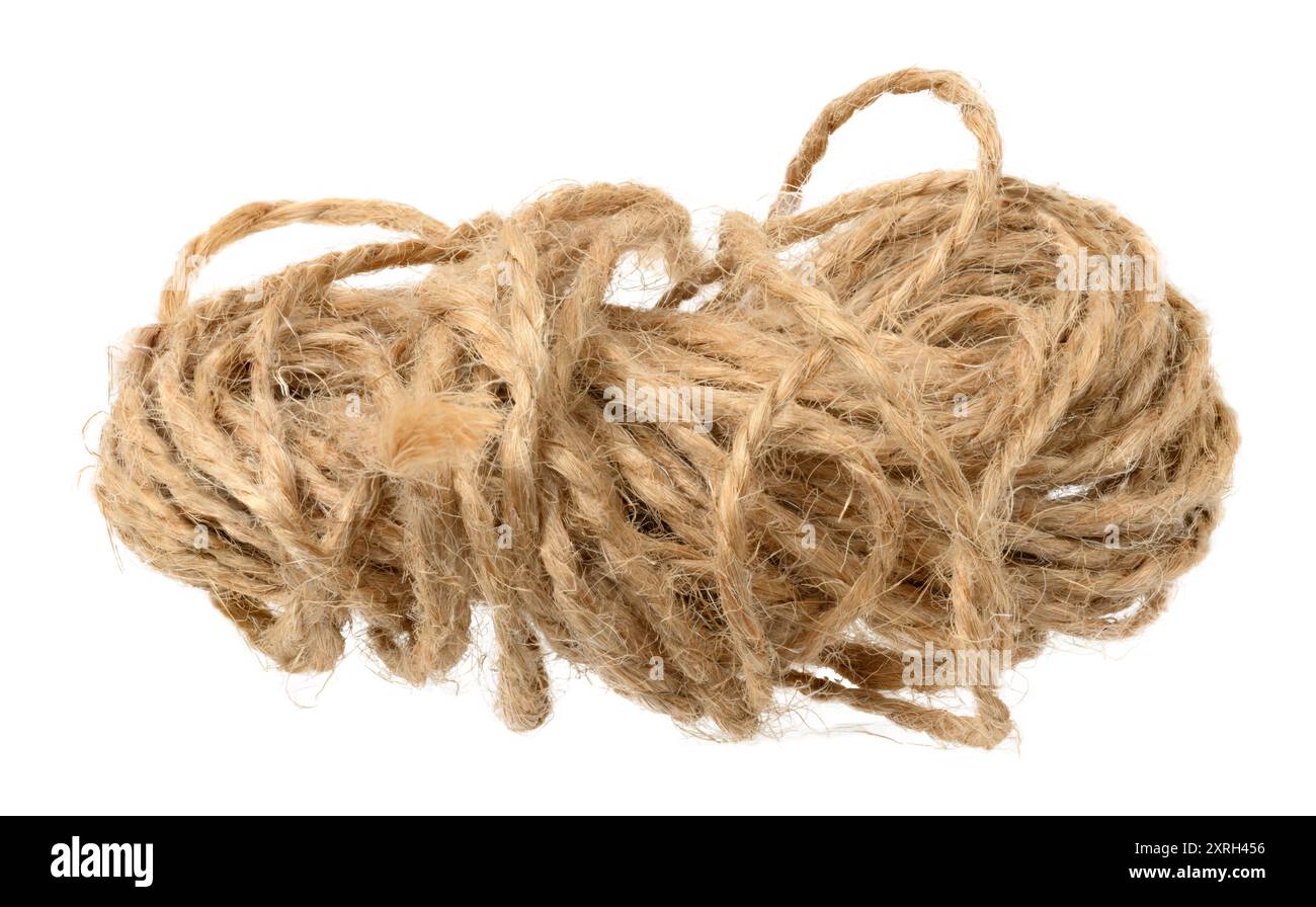 Brown twine rope on a white isolated background, top view. Packing ...