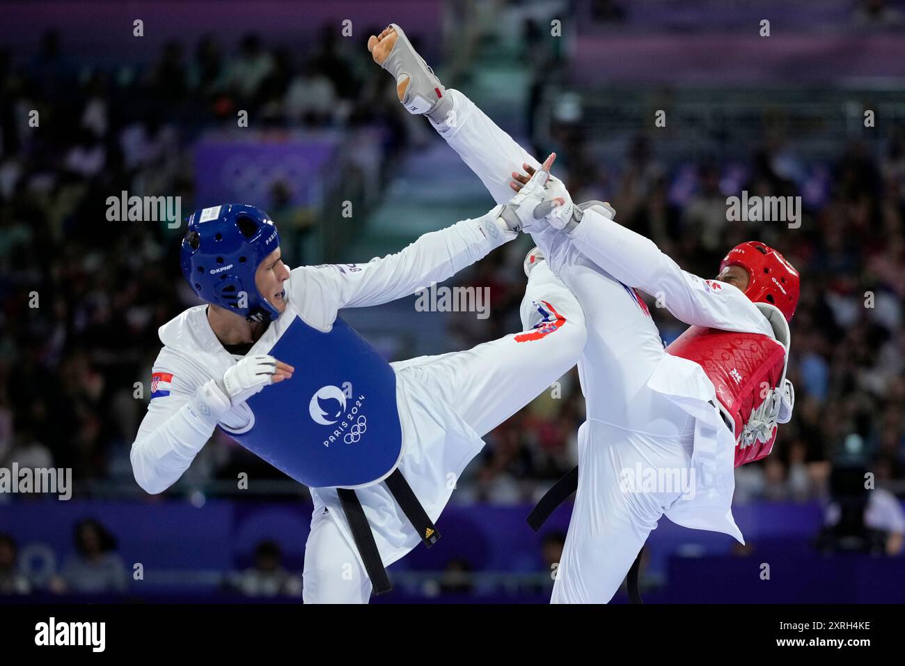 Croatia's Ivan Sapina competes with Cuba's Rafael Alba in a men's +80kg ...
