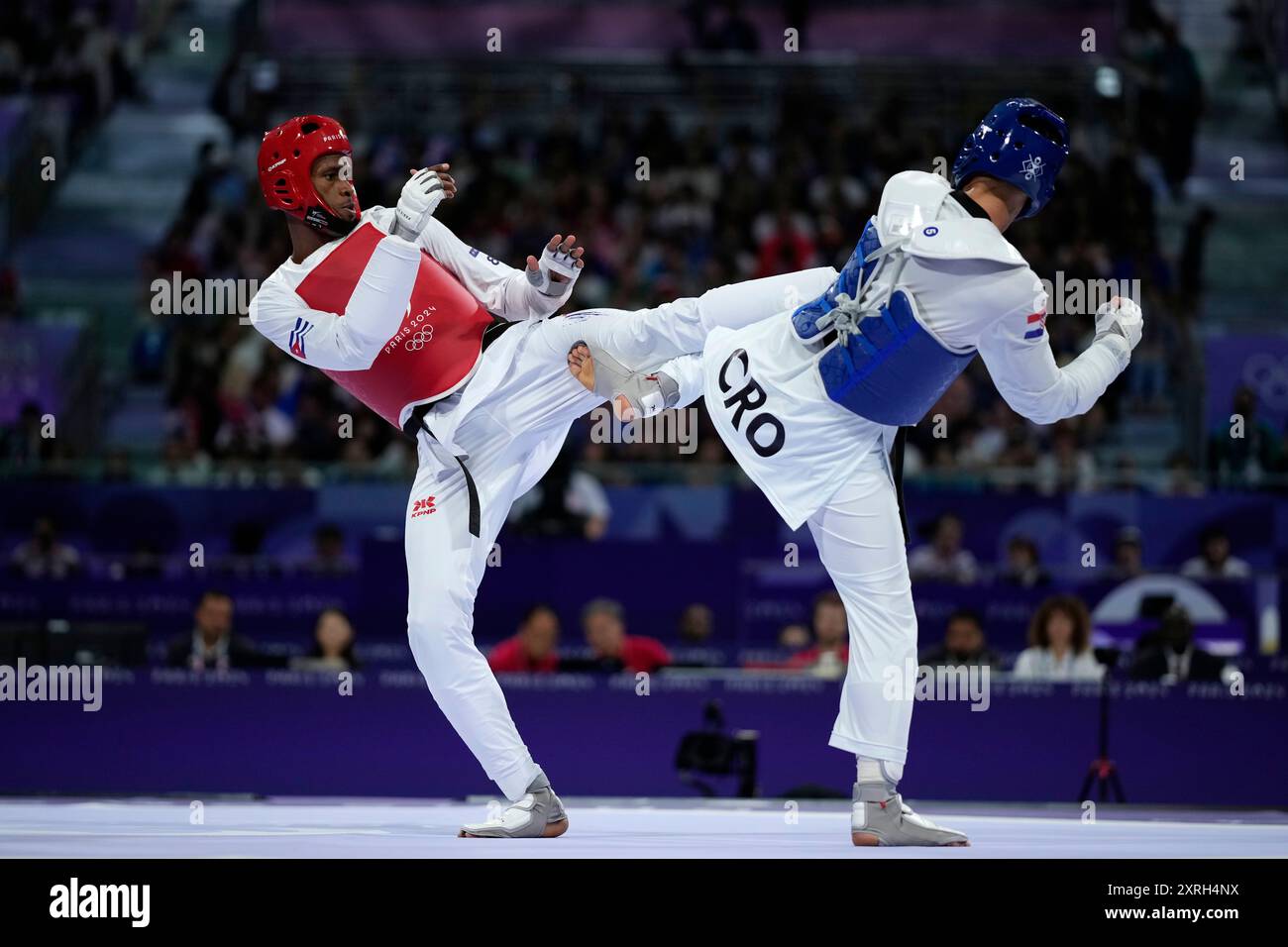 Croatia's Ivan Sapina competes with Cuba's Rafael Alba in a men's +80kg ...