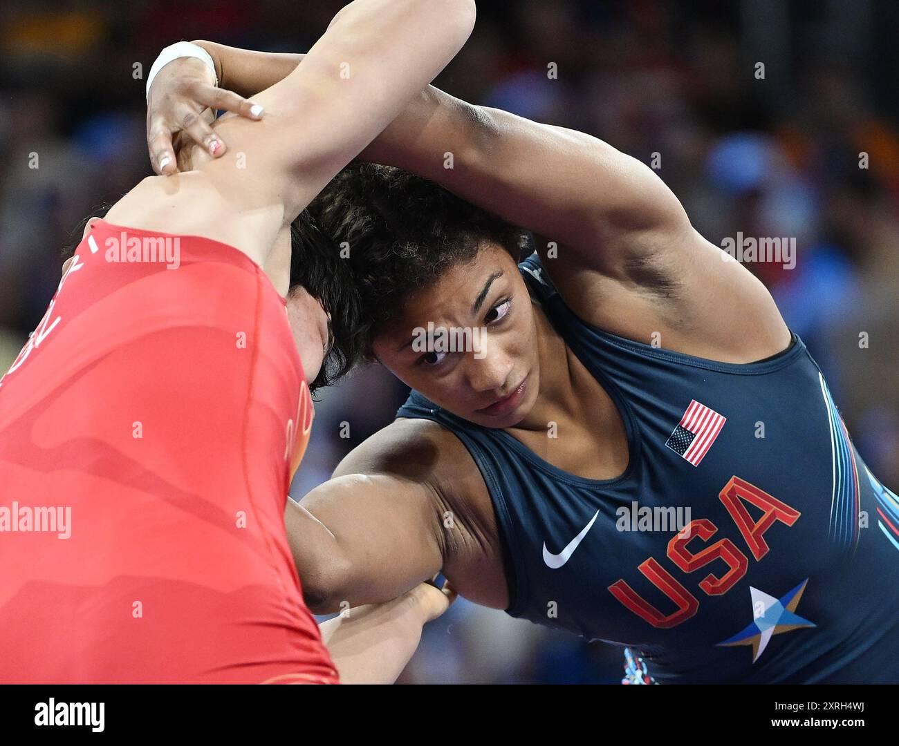 Paris, France. 10th Aug, 2024. Aiperi Medet Kyzy (in red) of Kyrgyzstan ...