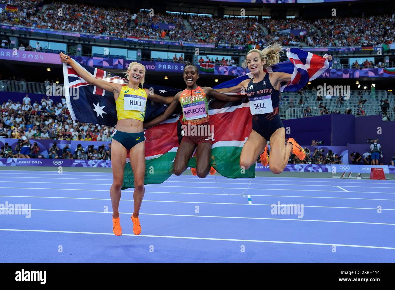 Women's 1500-meter gold medalist, Faith Kipyegon, of Kenya, centre ...