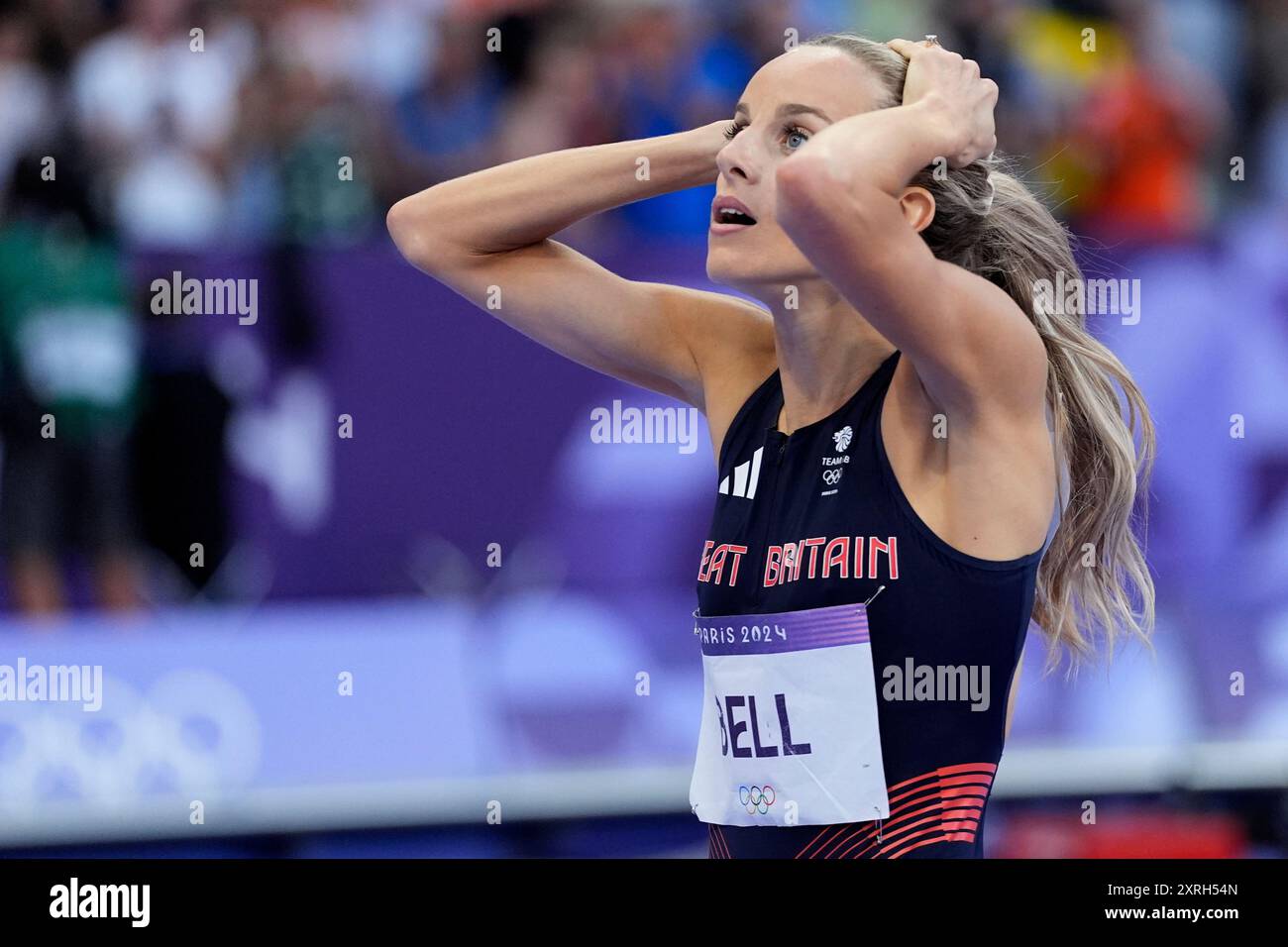 Georgia Bell, of Britain, reacts to her third place finish in the women ...