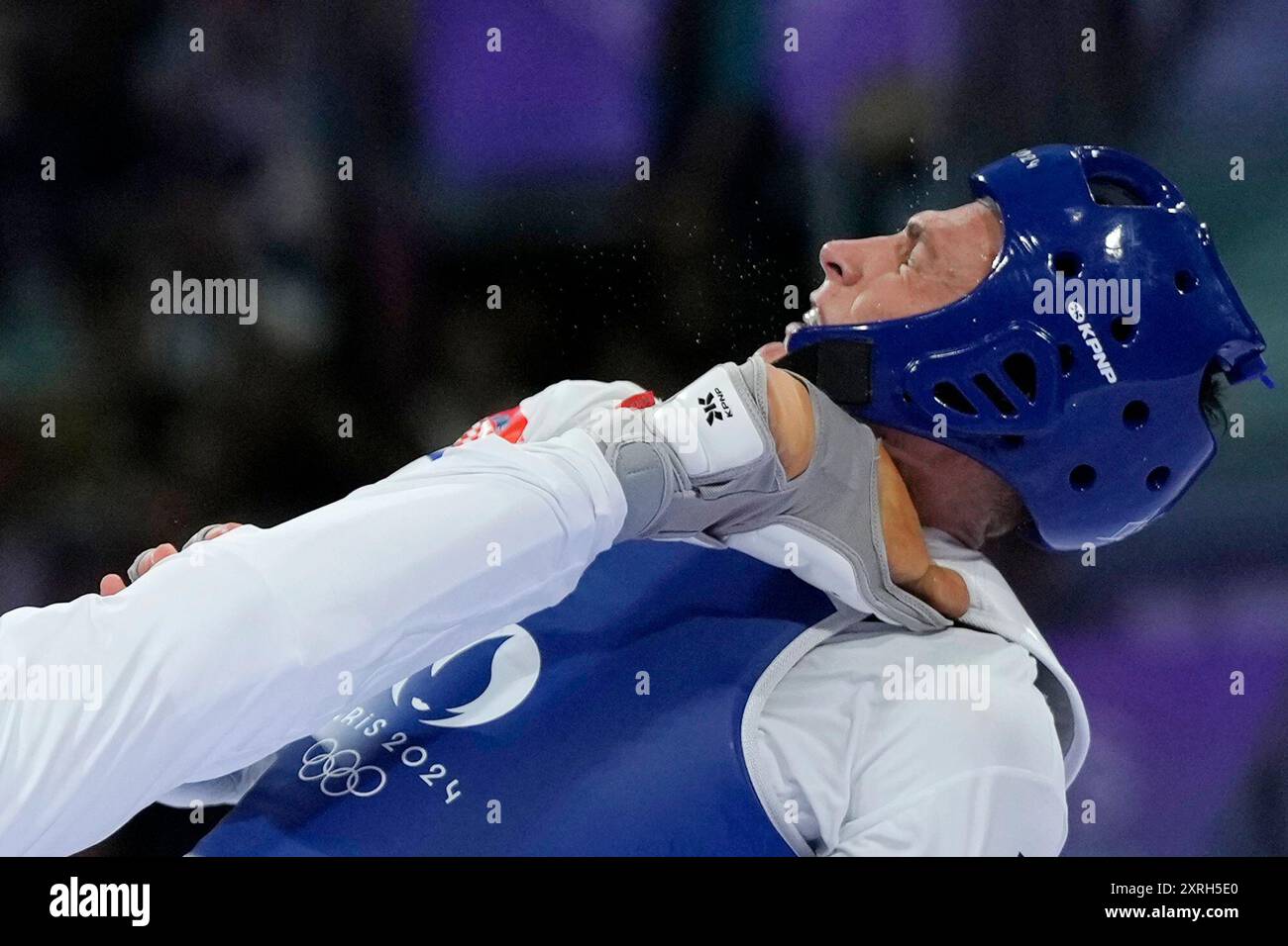 Croatia's Ivan Sapina, right, competes with Cuba's Rafael Alba in a men ...