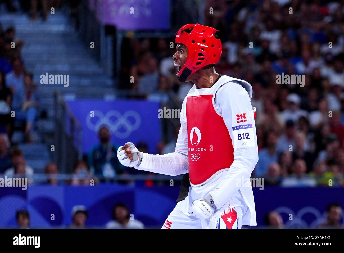 Cuba's Rafael Alba celebrates victory over Croatia's Ivan Sapina (not ...