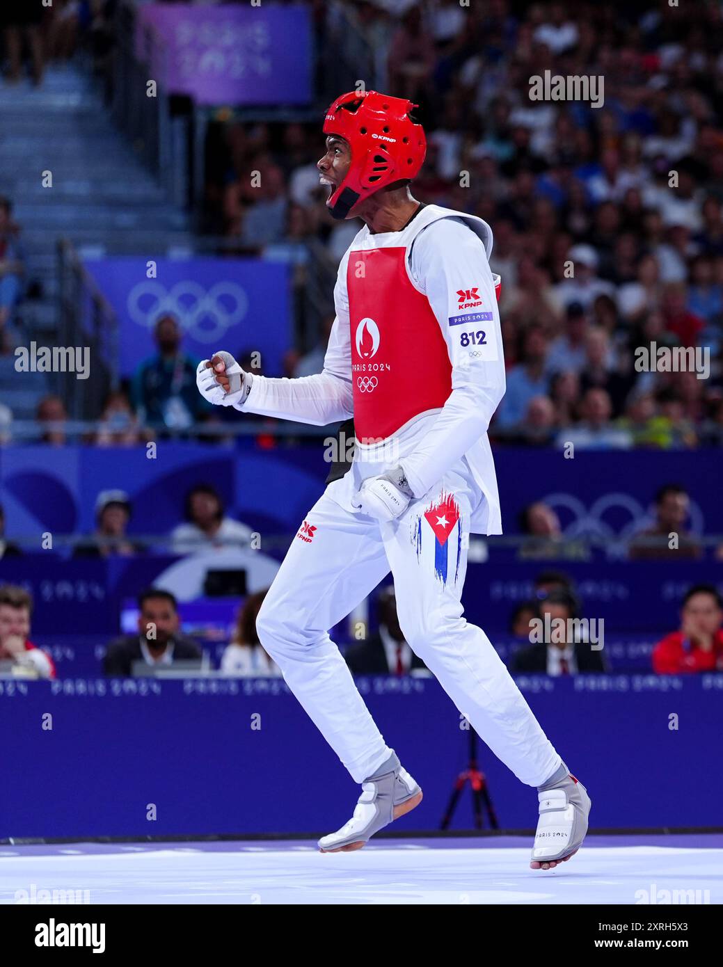 Cuba's Rafael Alba celebrates victory over Croatia's Ivan Sapina (not ...