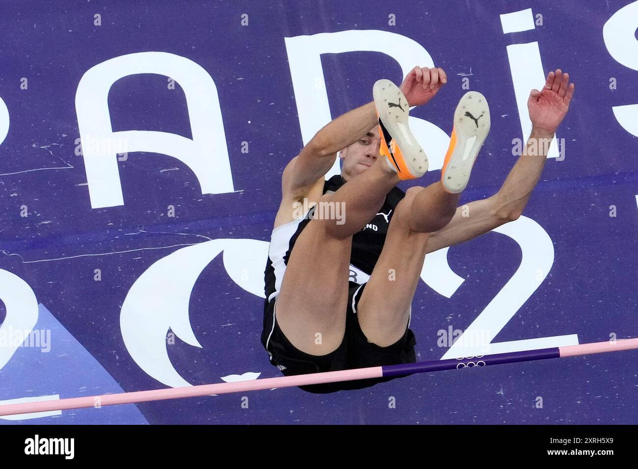 Hamish Kerr, of New Zealand, clears the bar in the men's high jump final at the 2024 Summer ...