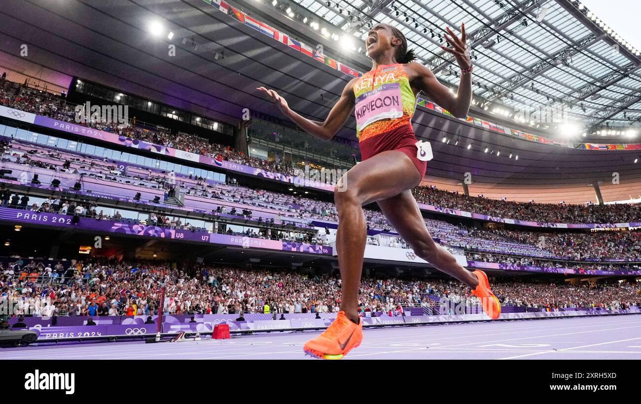 Faith Kipyegon, of Kenya, celebrates after winning the women's 1500 ...