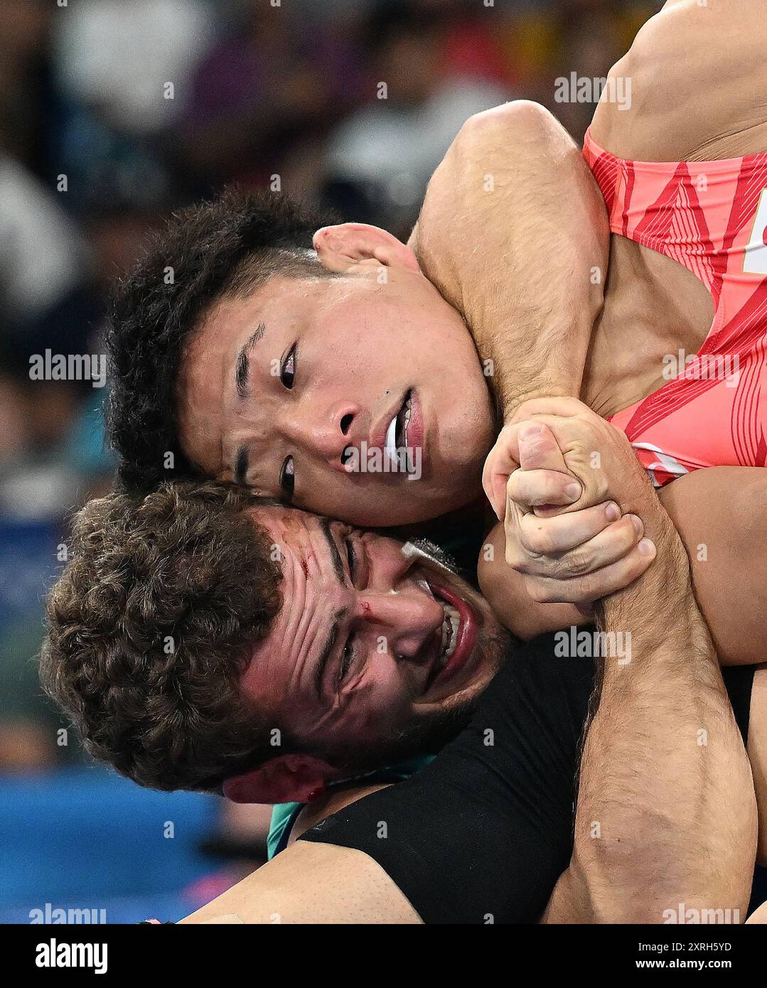 Paris, France. 10th Aug, 2024. Razambek Salambekovitch Jamalov (in blue ...