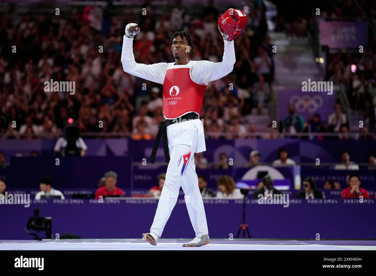 Cuba's Rafael Alba celebrates after winning the men's +80kg Taekwondo ...