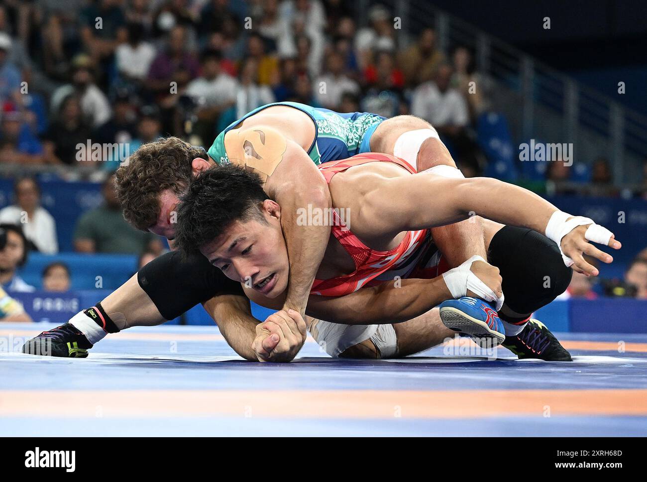 Paris, France. 10th Aug, 2024. Razambek Salambekovitch Jamalov (in blue ...