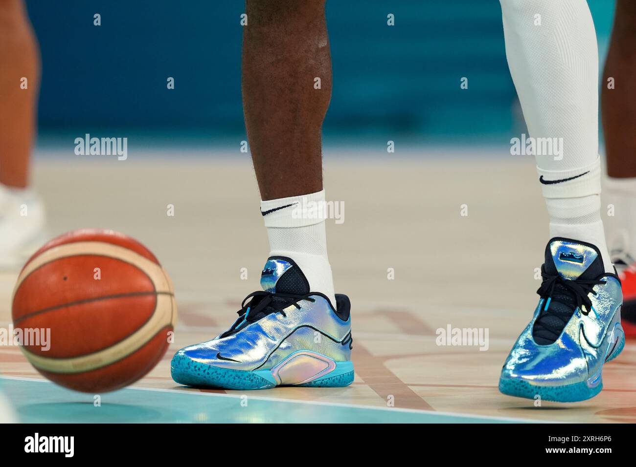 United States' LeBron James (6) wears shiny shoes while warming up ...