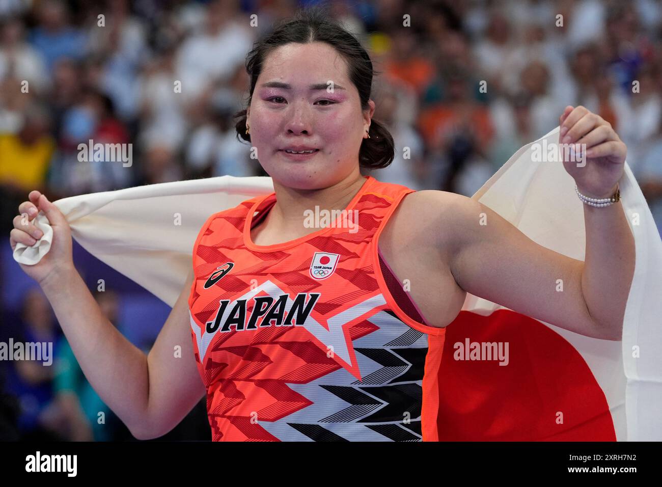Haruka Kitaguchi, of Japan, reacts to winning the women's javelin throw ...