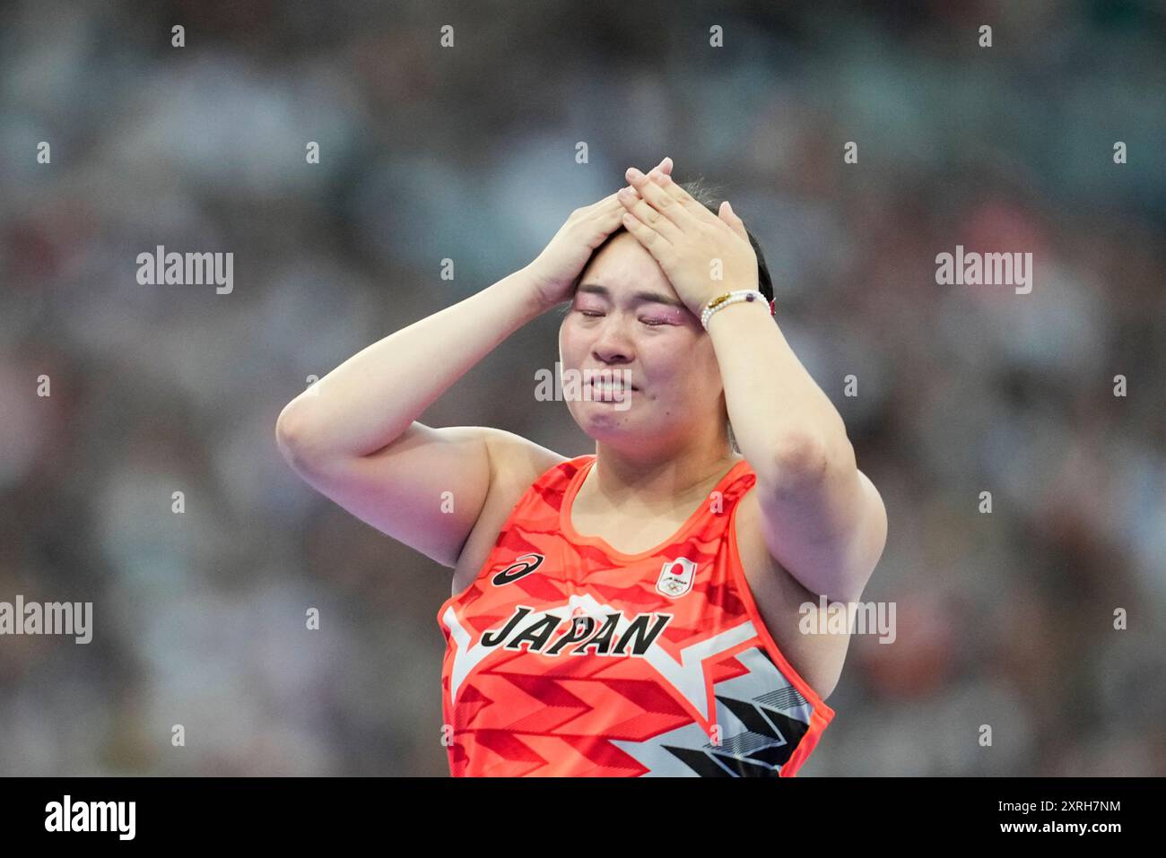Haruka Kitaguchi, of Japan, reacts after winning the gold medal in the women's javelin throw ...